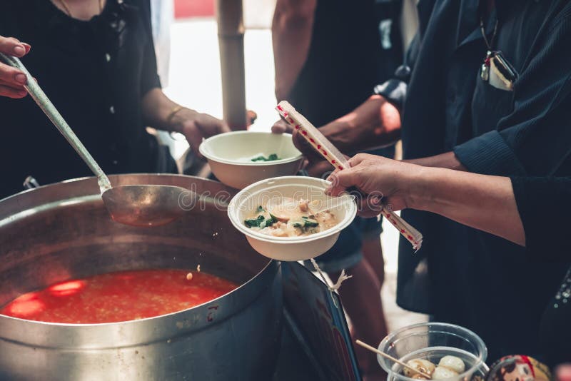 Free Food: the Human Need for Food is Assisted by Volunteers Stock ...