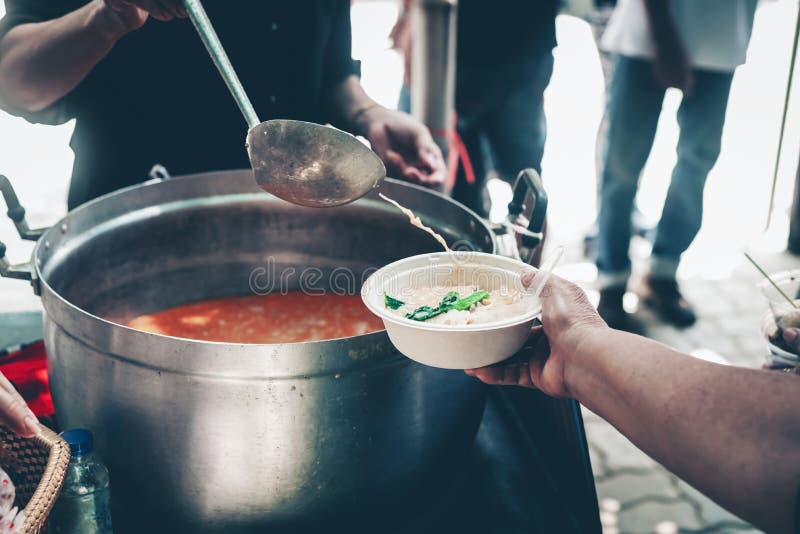 Free Food: the Human Need for Food is Assisted by Volunteers Stock ...