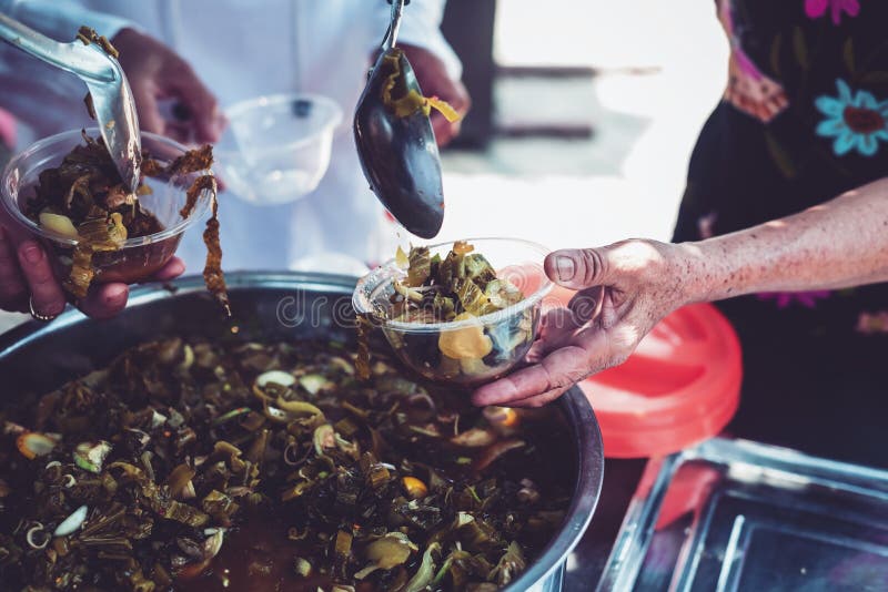 Free Food: the Human Need for Food is Assisted by Volunteers Stock ...