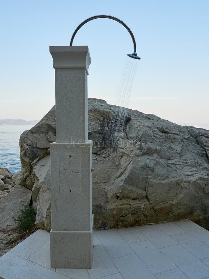 Shower on the beach. stock photo. Image of travel, rain - 49064618