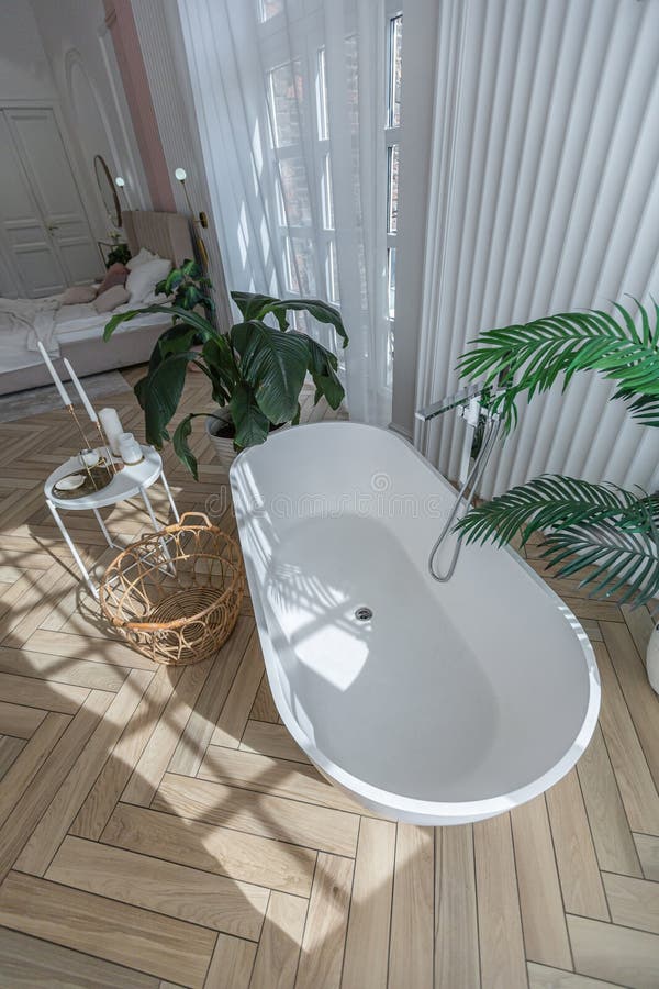 Free-standing Stylish Bath in a Spacious Open-plan Apartment with a ...