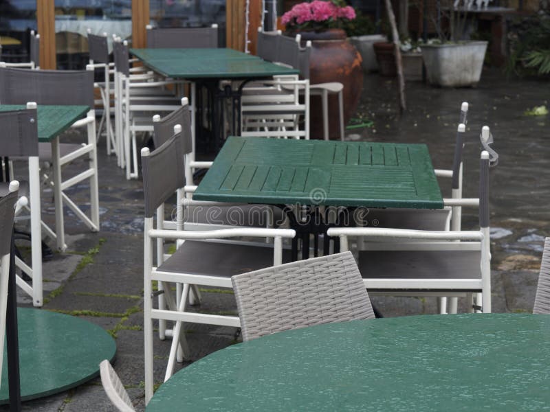 Free Tables and Chairs of a Summer Restaurant on the Terrace in the ...