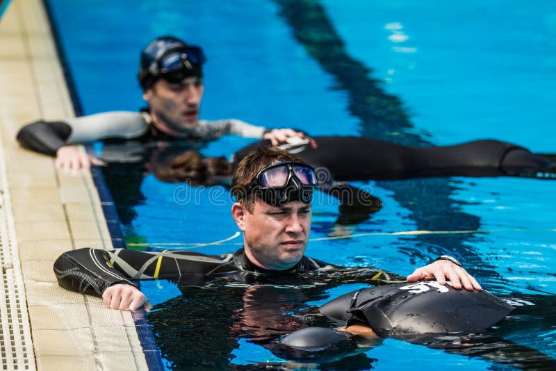 Freediver Doing Static Performance with Coach a Coach Doing the ...