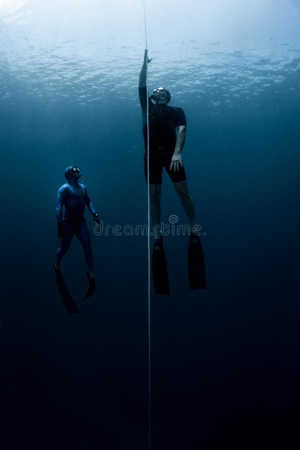 Freedivers underwater stock image. Image of safety, apnea - 90008481