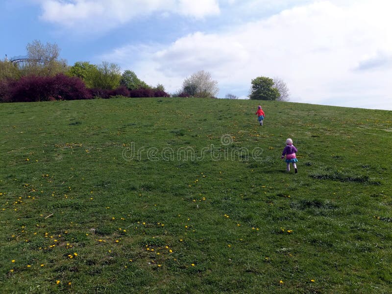 Freedom, Children Running Across a Green Hill Stock Photo - Image of ...