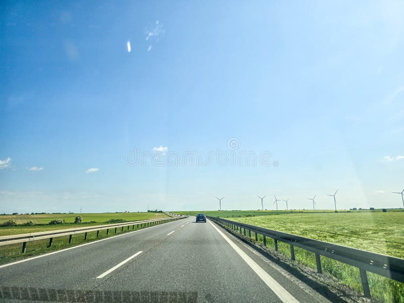 Freedom in Every Step Road through Fields and Windmills Stock Image ...