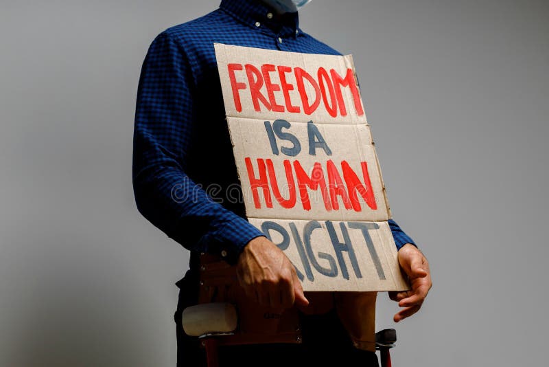 Freedom is a Human Right Placard in Hands of Protester Stock Image ...