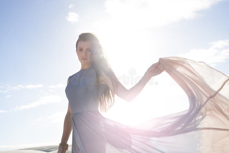Freedom and Isolation on the Beach. a Beautiful Young Woman on the ...