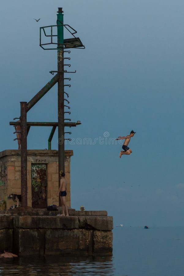 Freedom jump editorial image. Image of happy, water - 127148580