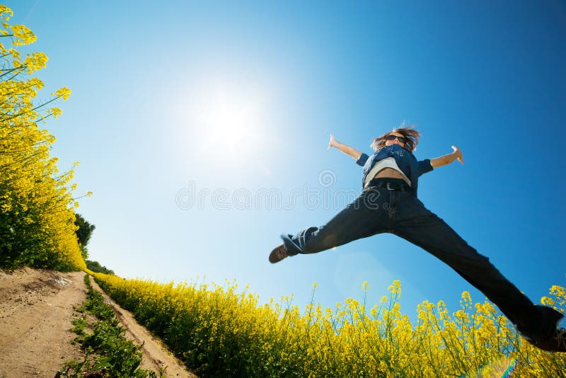 Freedom jump on the field stock image. Image of lifestyle - 20226677
