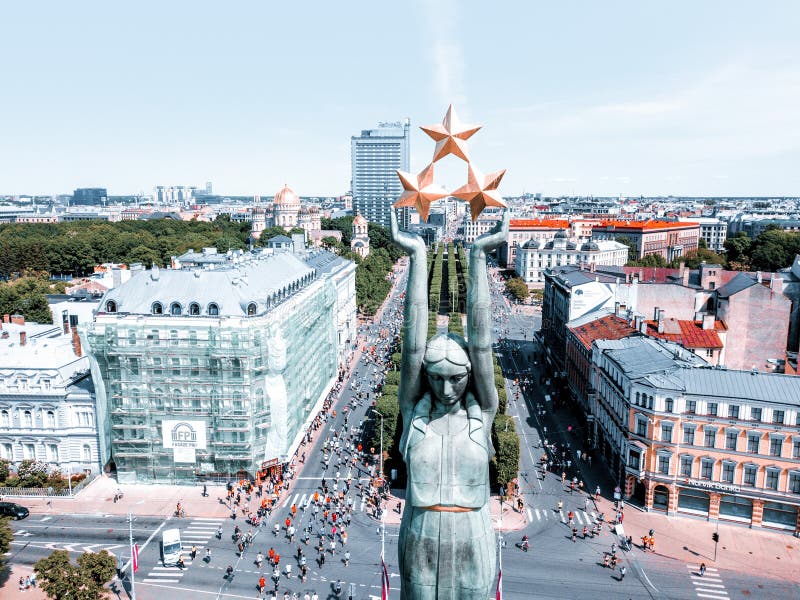 Freedom Monument Surrounded by Buildings Under the Sunlight in Riga ...