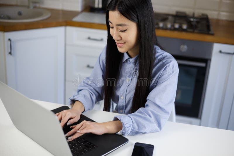 Freelance BIPOC Programmer Coding on Notebook Computer. Cheerful ... Freelance BIPOC Programmer Coding on Notebook Computer. Cheerful ...