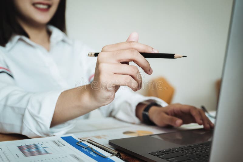 Freelance Concept, Female Hand Holding Pen Point Computers To Design ...