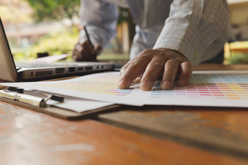 Freelance Graphic Designer Using Digital Tablet, Computer, Man W Stock ...