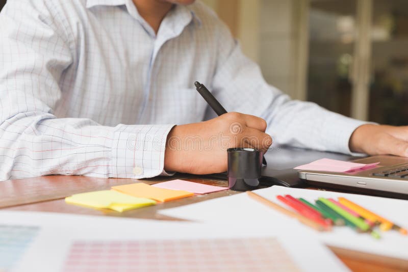 Freelance Graphic Designer Using Digital Tablet, Computer, Man W Stock ...