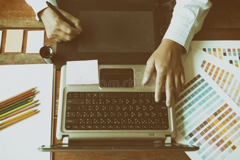 Freelance Graphic Designer Using Digital Tablet, Computer, Man W Stock ...