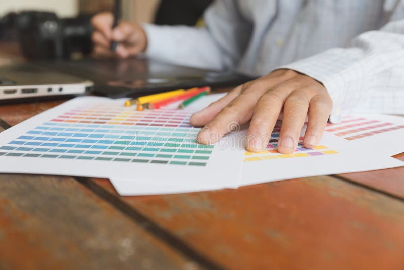 Freelance Graphic Designer Using Digital Tablet, Computer, Man W Stock ...