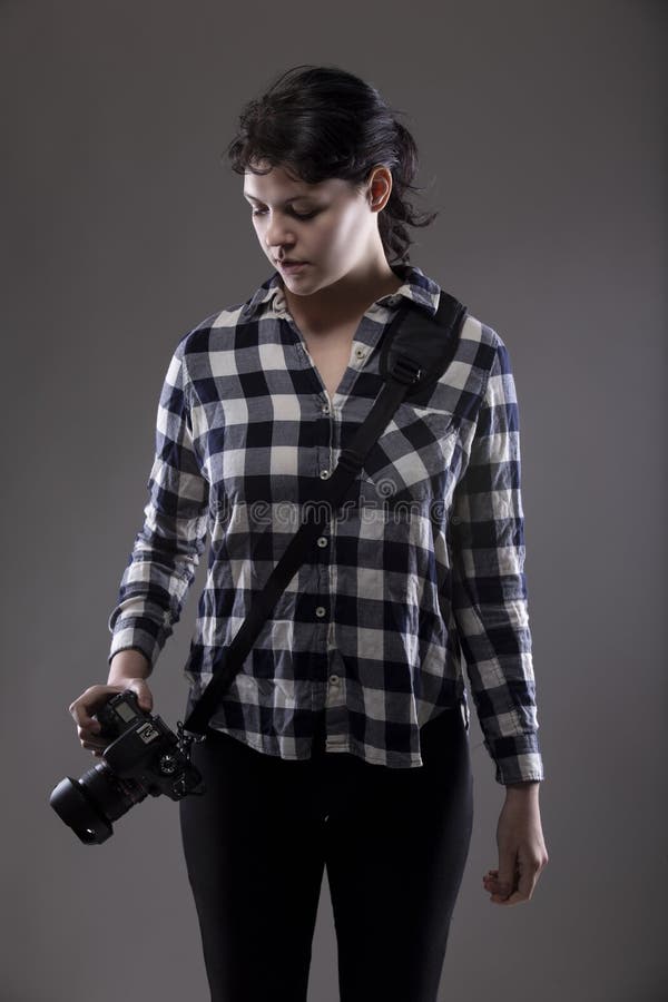 Freelance Photographer Posing in a Studio with a Camera Stock Image ...