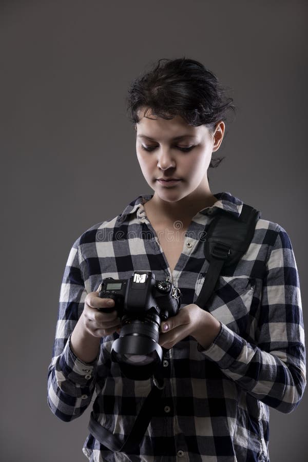 Freelance Photographer Posing in a Studio with a Camera Stock Photo ...