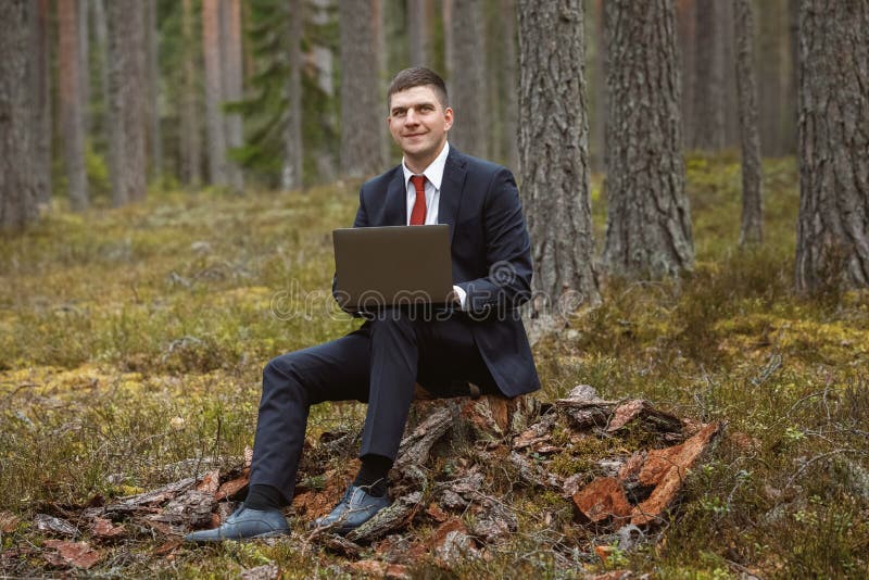 Freelancer with Laptop Working in Forest Stock Image - Image of outdoor ...
