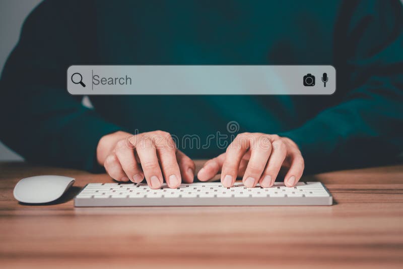 Freelancer`s Hand Using a Computer Keyboard To Search for Information ...