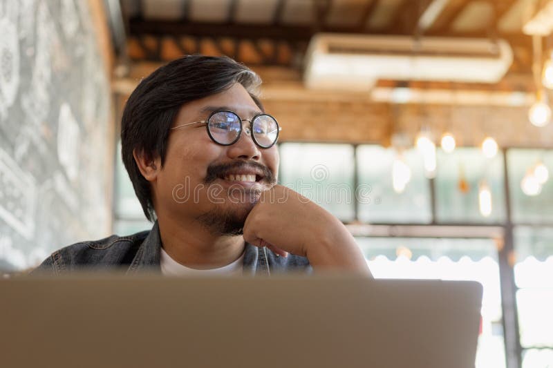 Freelancer is Thinking Idea or Trying To Solve a Problem at Cafe. a Man ...