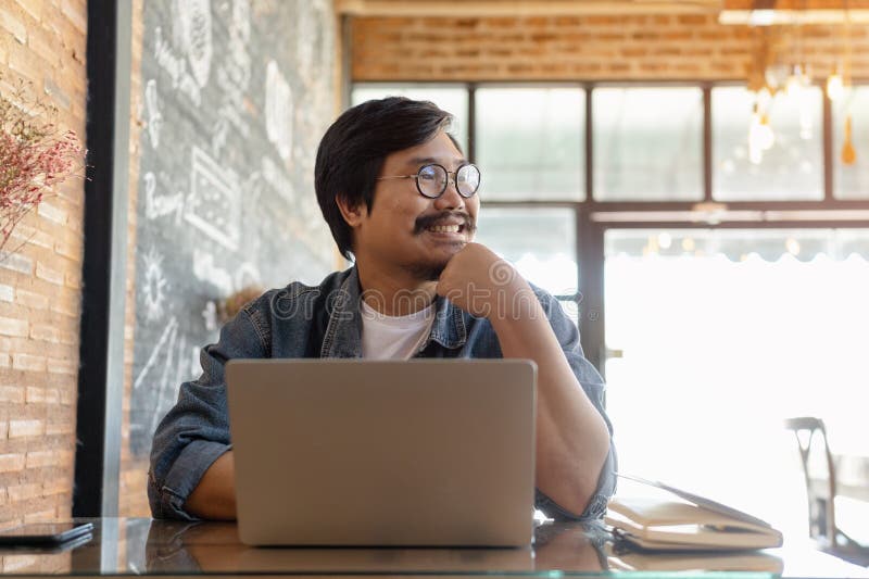 Freelancer is Thinking Idea or Trying To Solve a Problem at Cafe. a Man ...