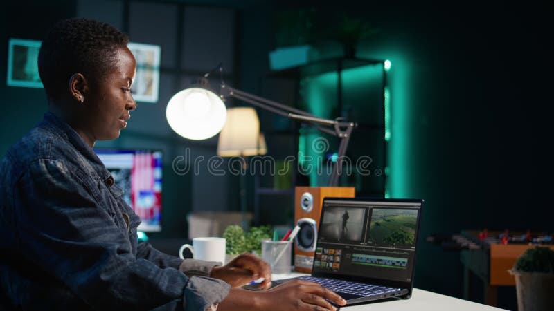 Freelancer Using Editing Tools on Computer To Cut Movie Project Footage ...