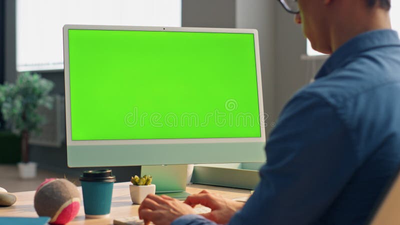 Freelancer Using Green Screen Computer in Office Close Up. Business Man ...