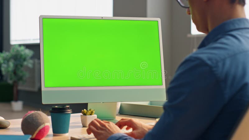 Freelancer Using Green Screen Computer in Office Close Up. Business Man ...