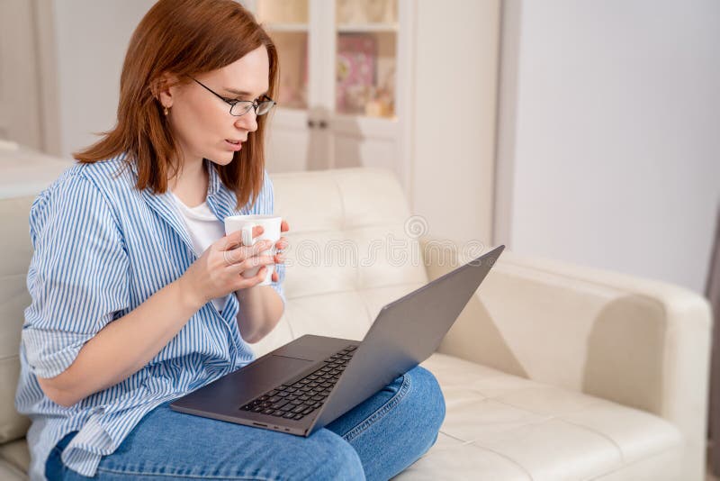 Freelancer Woman Working at Computer, Drinks Tea. Stock Photo - Image ...