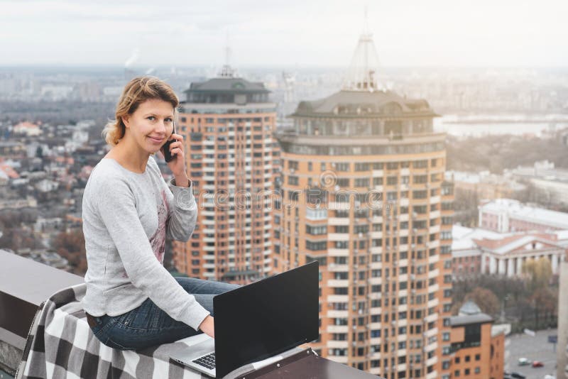 Freelancer Working on the Rooftop of Skyscraper Stock Photo - Image of ...