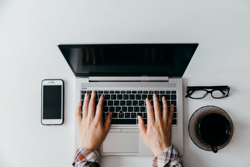 Freelancer Workplace on a White Background and Hands with Place for ...