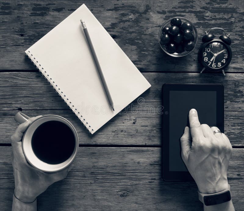 Freelancer Works with a Tablet Computer at Home at the Table, Stock ...