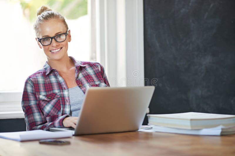 Freelancing Pays the Bills. a Young Woman Working from Home. Stock ...