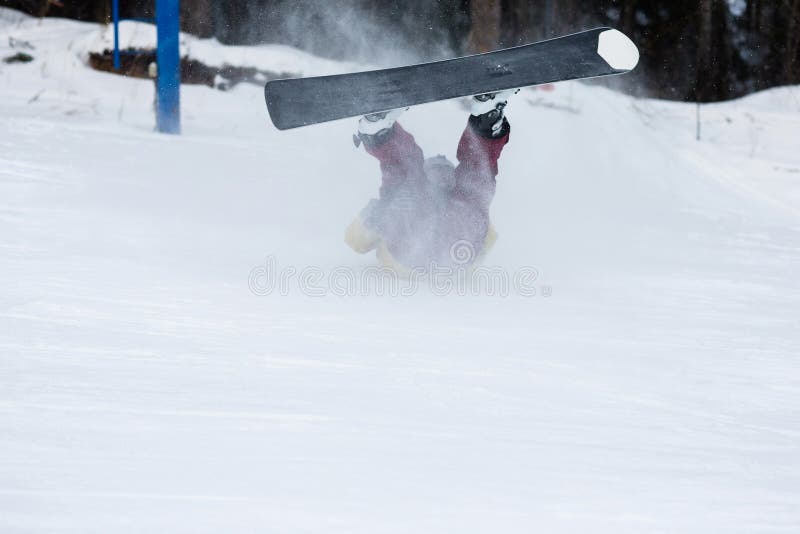Snowboarder falling down stock photo. Image of horizon - 10385022