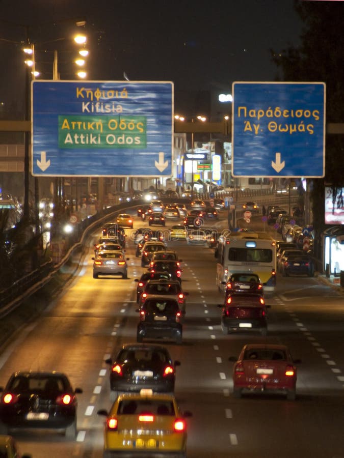 Freeway and cars at night stock photo. Image of sighs - 13623616