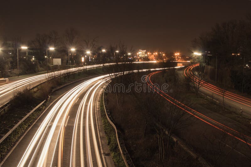 Car lights at night stock image. Image of long, road - 12690817