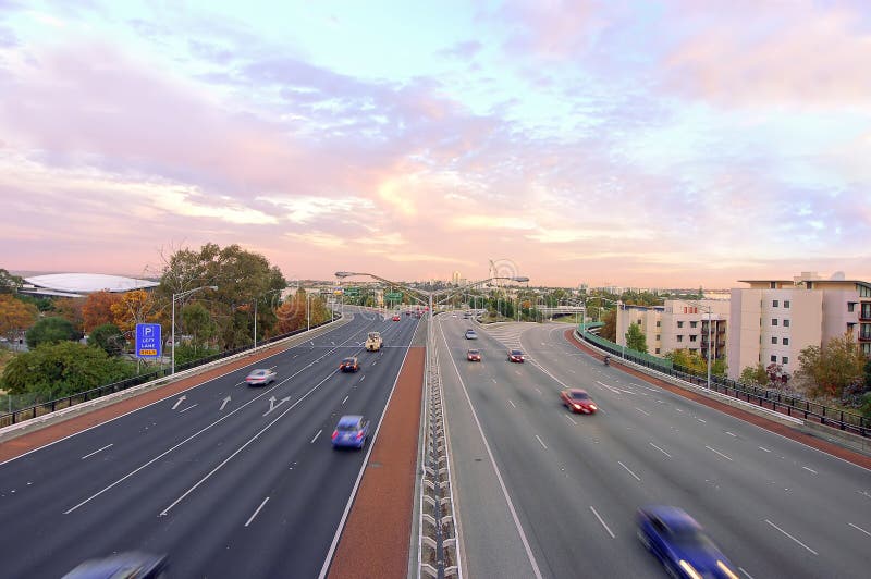 Freeway Sunset Shot with Traffic Stock Photo - Image of signs, traffic ...