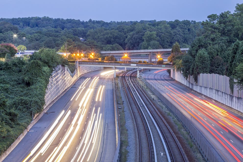 Freeway with train tracks stock image. Image of highway - 92481509