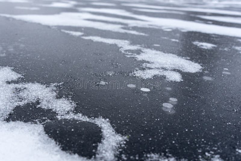 Freeze Bubbles in Solid Layer of Ice of a Frozen River Stock Photo ...