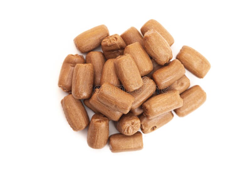 Freeze Dried Brown Chocolate Candy Rolls on a White Background Stock ...