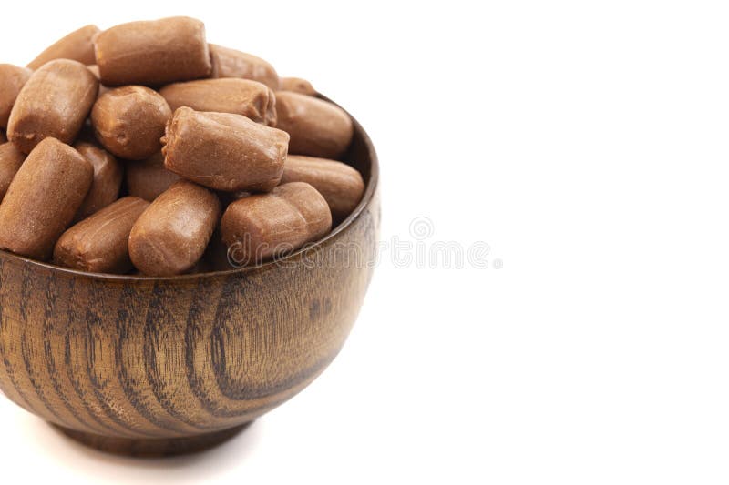 Freeze Dried Brown Chocolate Candy Rolls on a White Background Stock ...