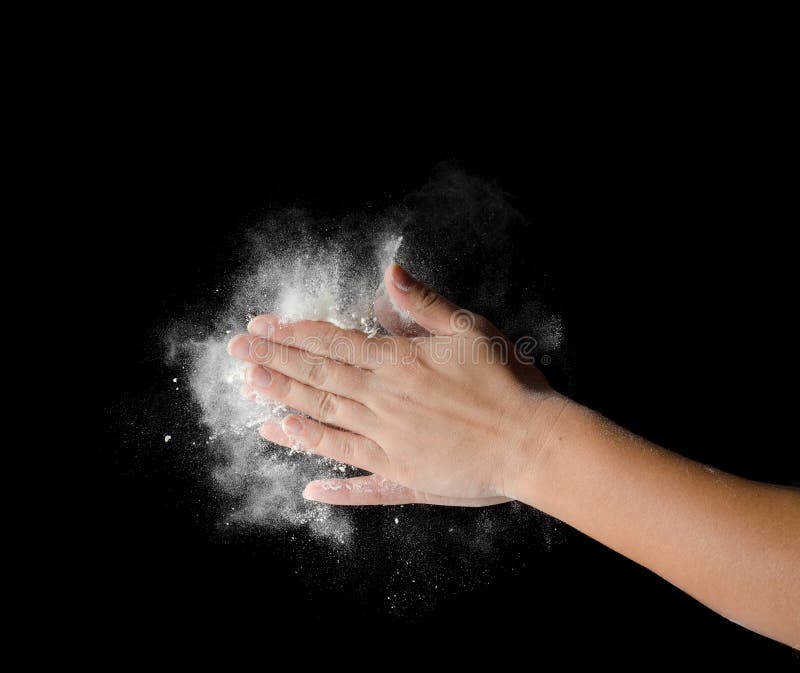 Freeze Motion of Dust Explosion in Hands on Black Stock Image - Image ...