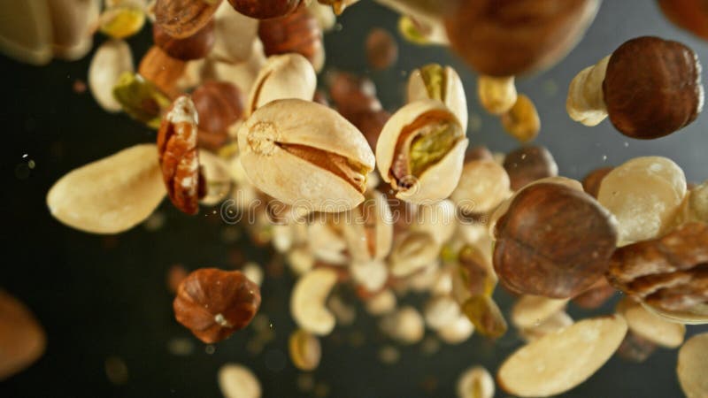 Freeze Motion of Flying Mix of Nuts Stock Photo - Image of health ...