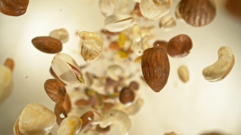 Freeze Motion of Flying Mix of Nuts Stock Photo - Image of broken ...