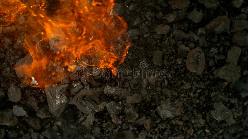 Freeze Motion of Rotating Coal Pieces with Fire Stock Image - Image of ...