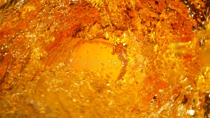 Freeze Motion Shot of Whisky or Cider Stock Photo - Image of wave ...