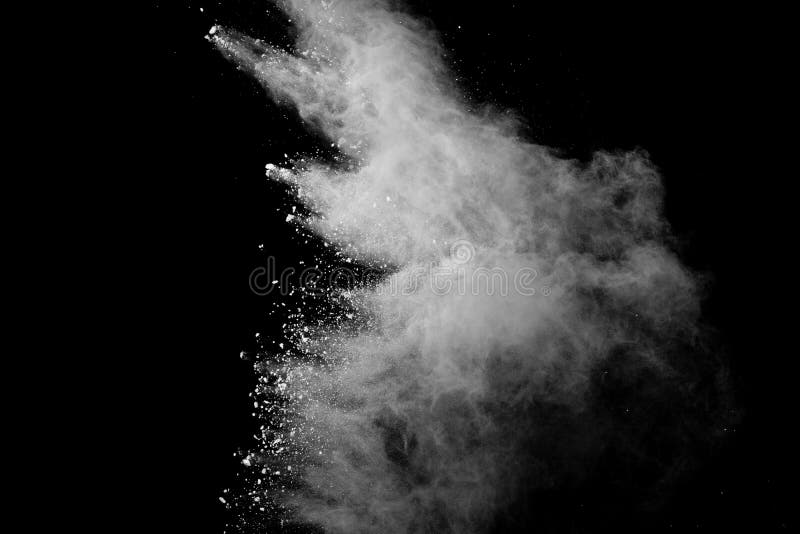 Freeze Motion of White Color Powder Exploding on Black Background Stock ...