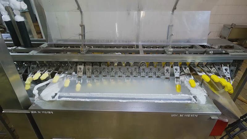 Freezing Ice Cream on the Conveyor. Ice Cream Production Process Stock ...